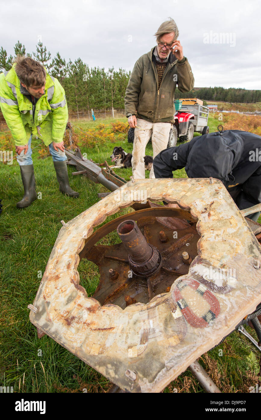 Hugh Piggott doing maintenance on his home made wind turbines in ...