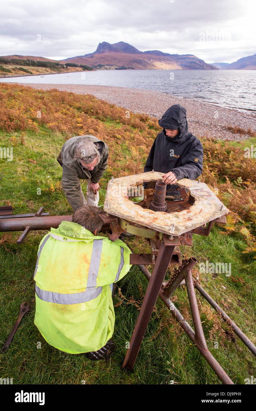 Hugh Piggott doing maintenance on his home made wind turbines in ...