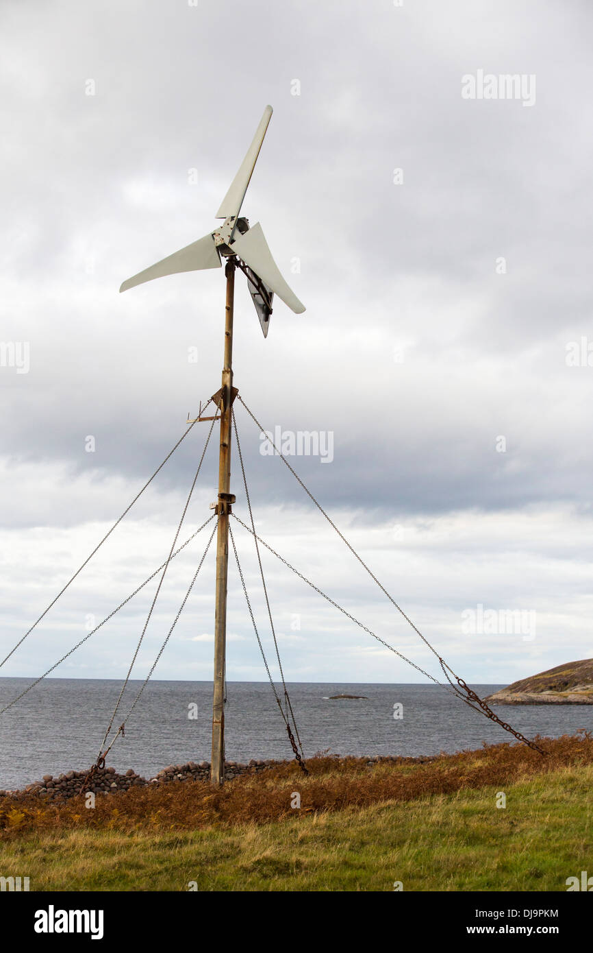 A wind turbine in Scoraig, in NW Scotland, one of the most remote ...