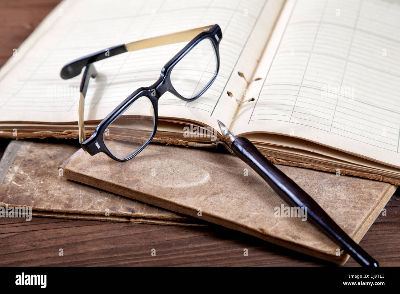 Still-life with old writing-books a nib Stock Photo - Alamy