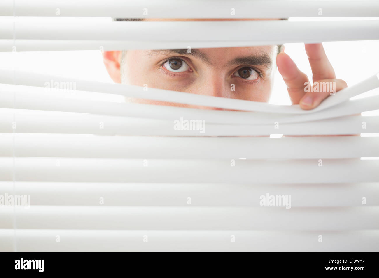 Suspicious man eyes close up hi-res stock photography and images - Alamy
