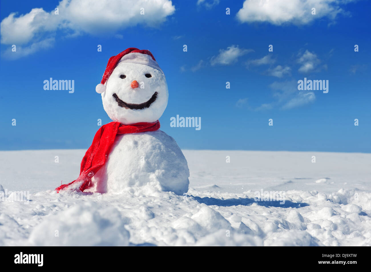 snowman on blue sky background Stock Photo - Alamy