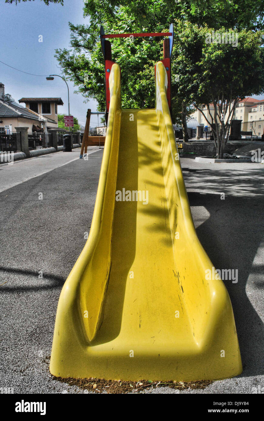 Yellow Park Slide Stock Photo - Alamy