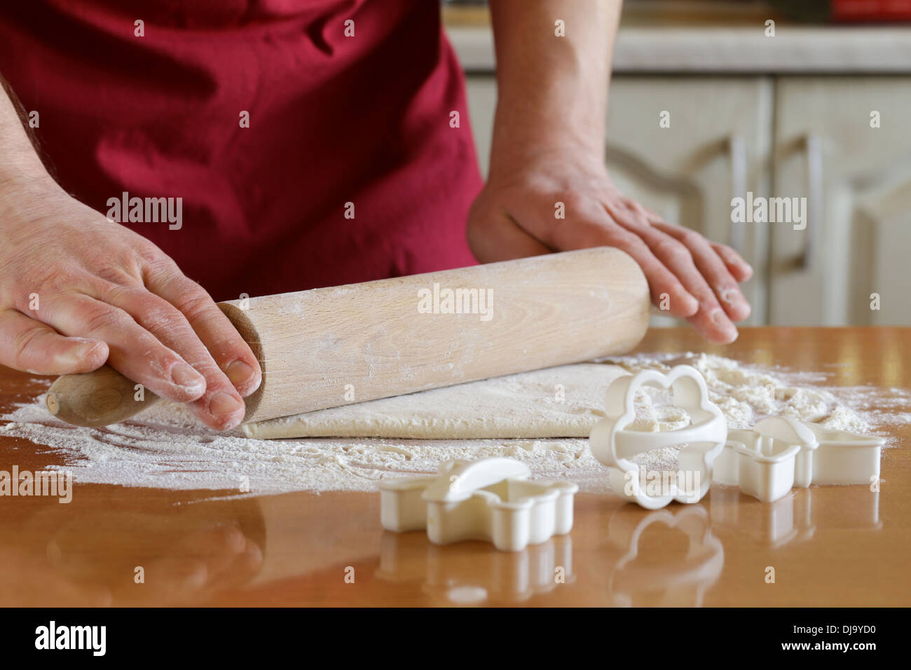 hand man chef cooking the dough on a wooden table Stock Photo - Alamy