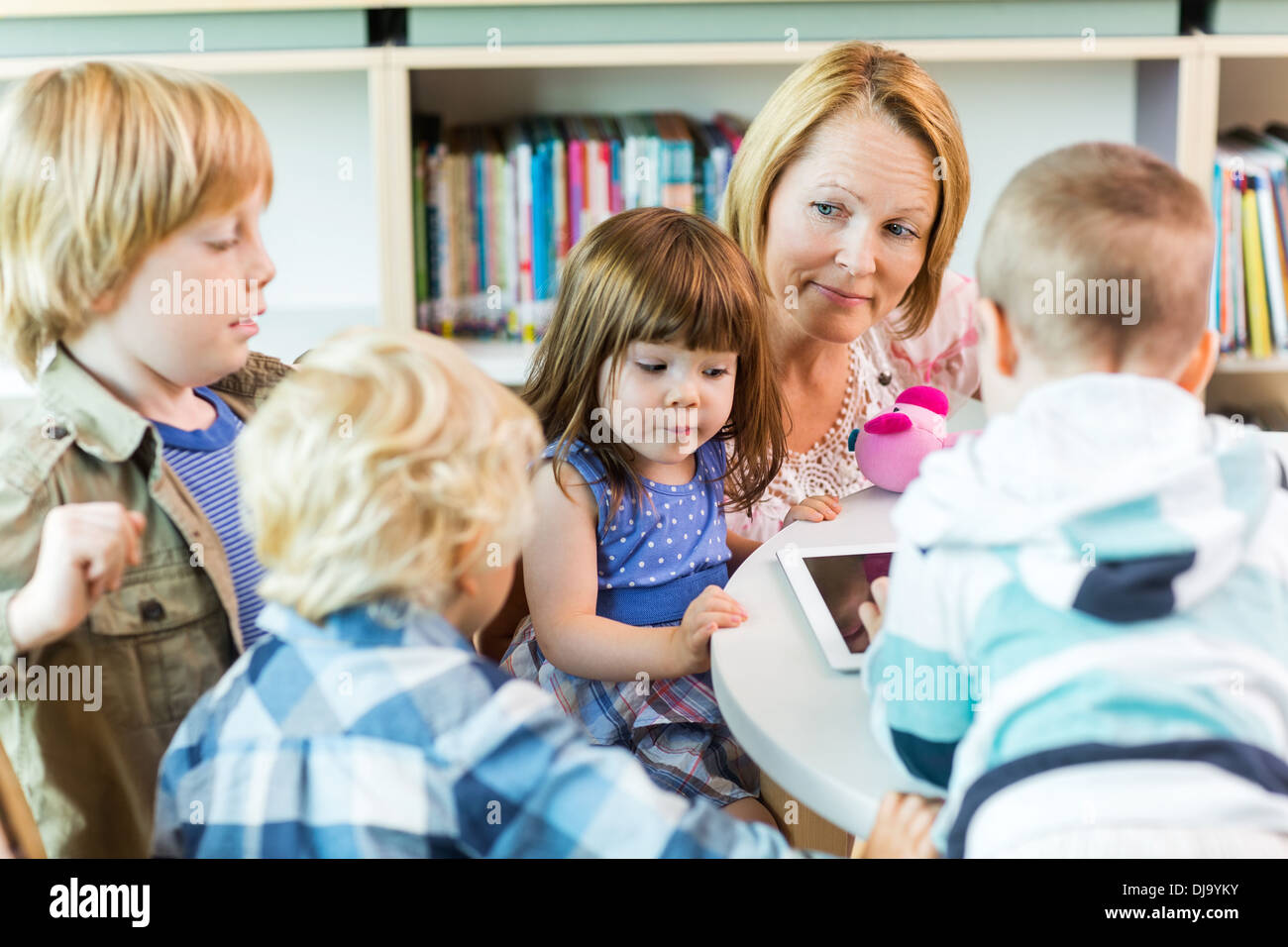 Female teacher school library students hi-res stock photography and ...