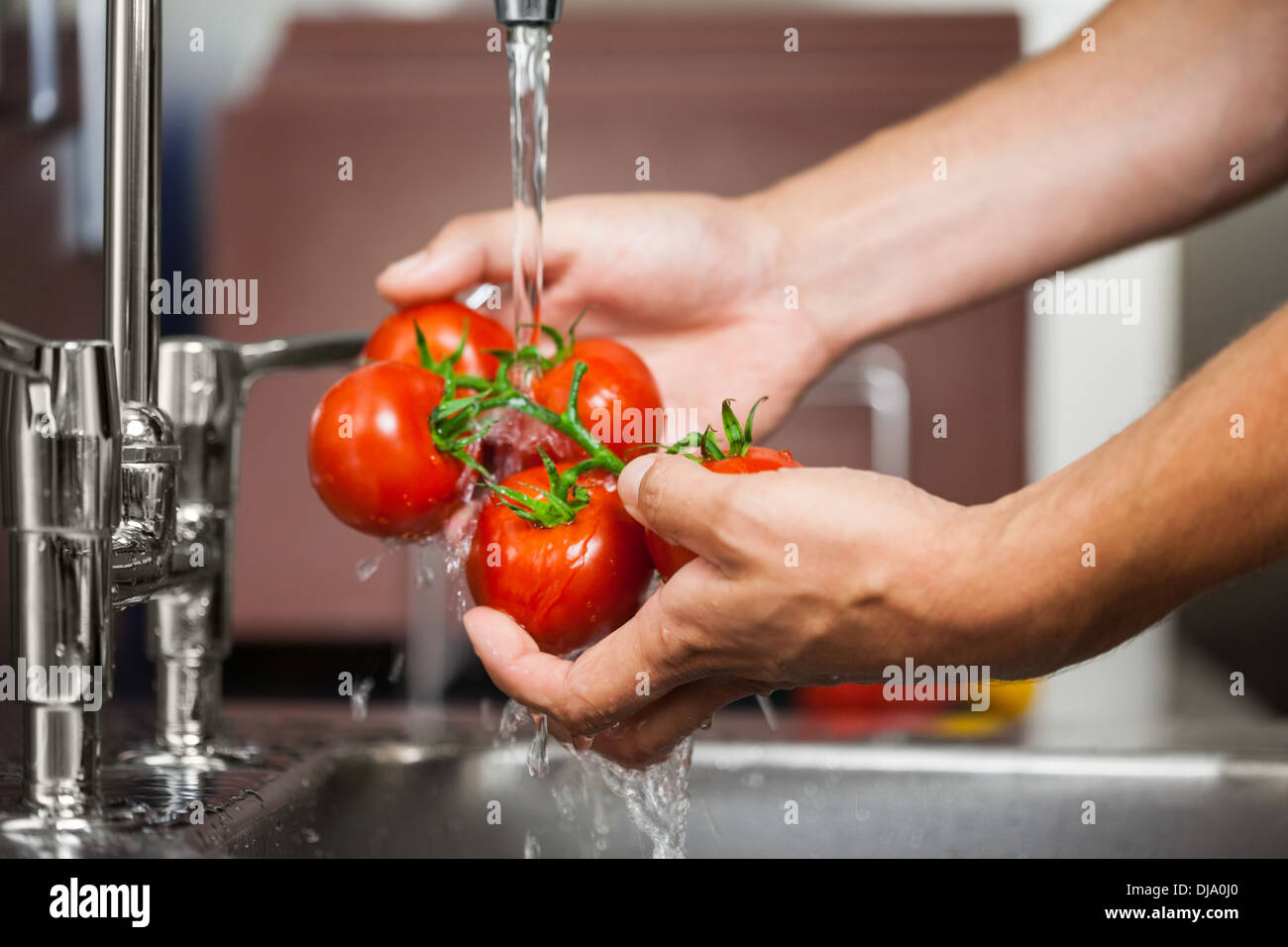 Cleaning tomatoes hi-res stock photography and images - Alamy