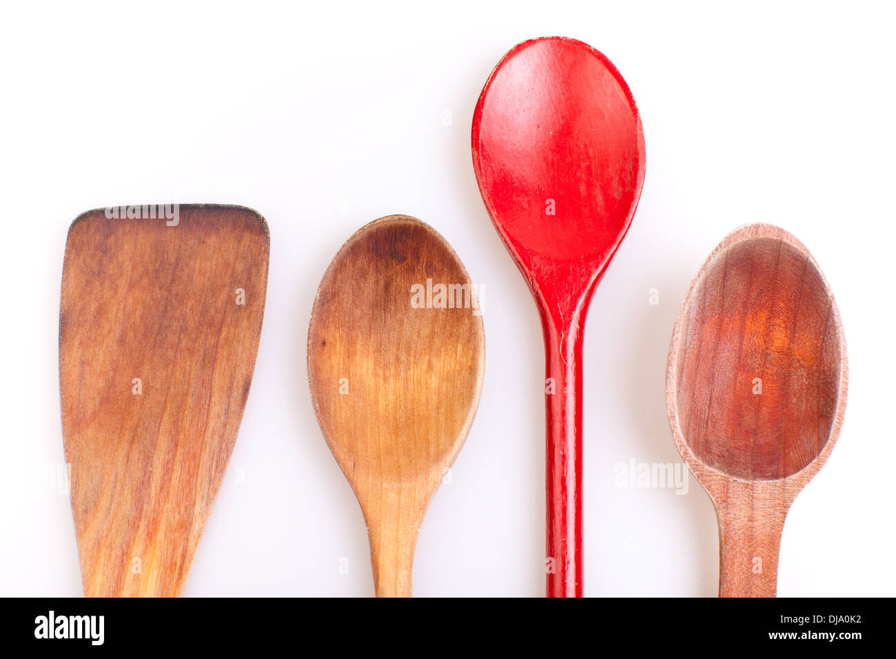 abstract leadership shown with red and wooden spoons Stock Photo - Alamy