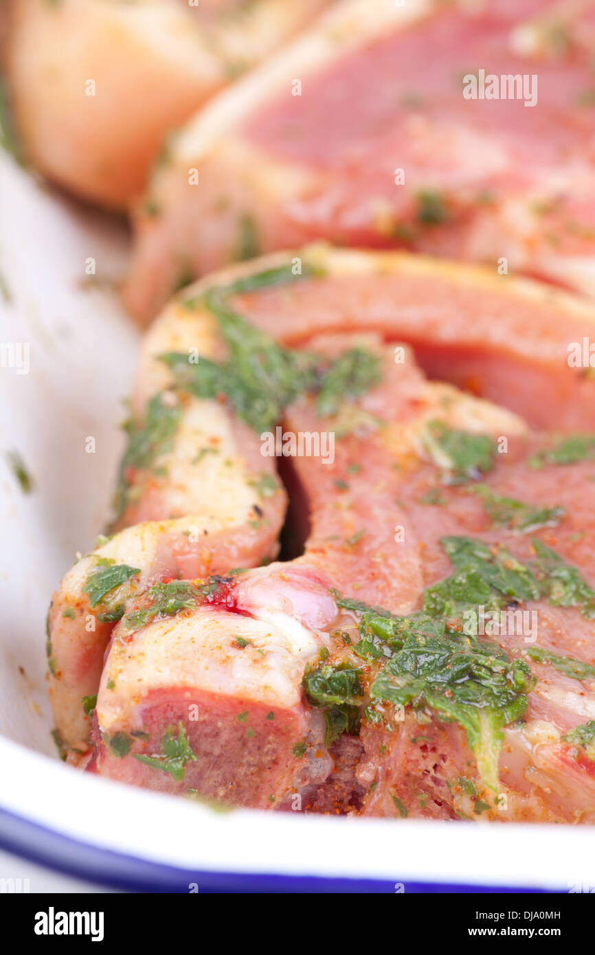seasoned lamb chops prepared for cooking in the tray Stock Photo - Alamy