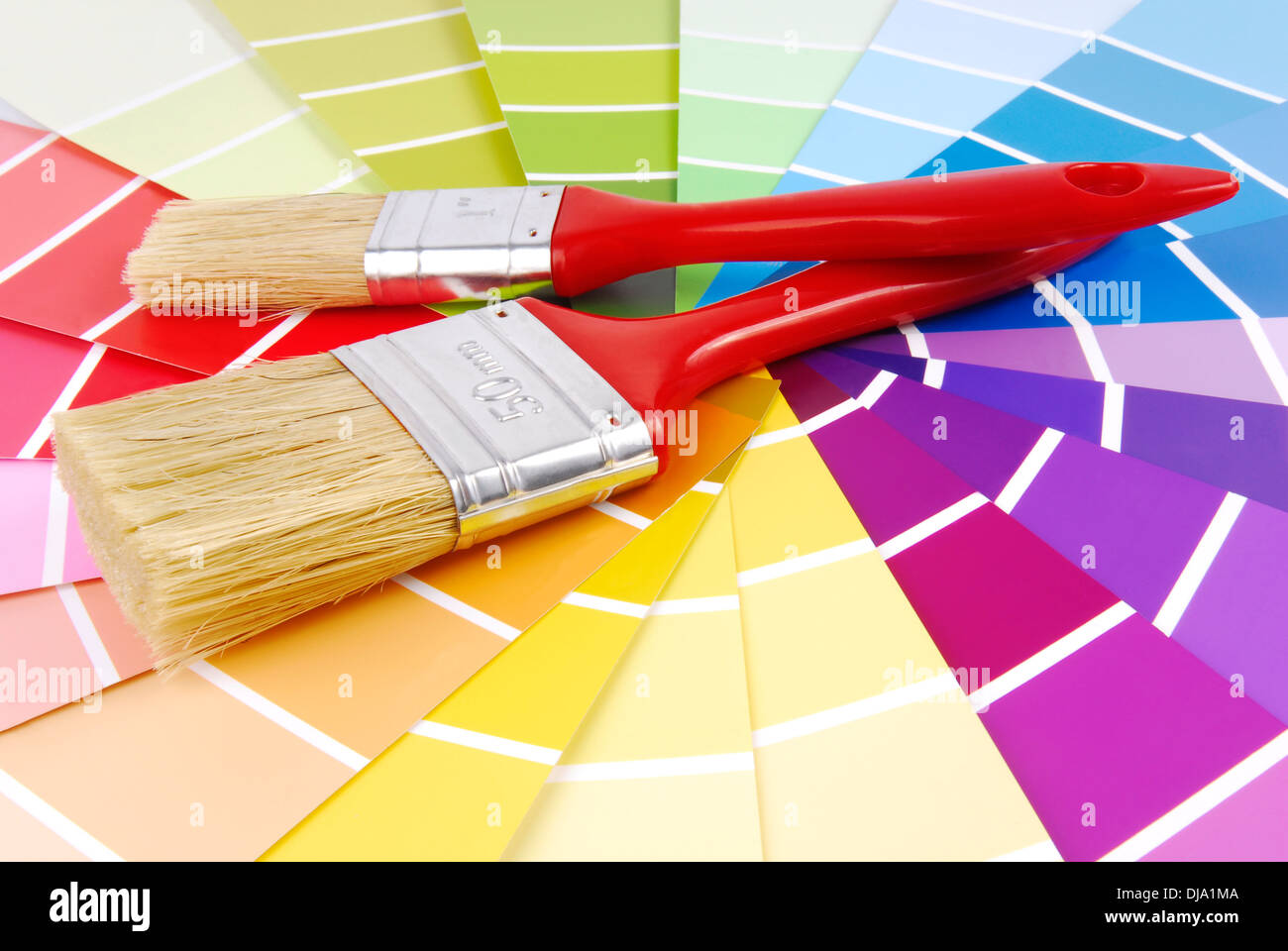 color guide sampler and paint brush Stock Photo - Alamy
