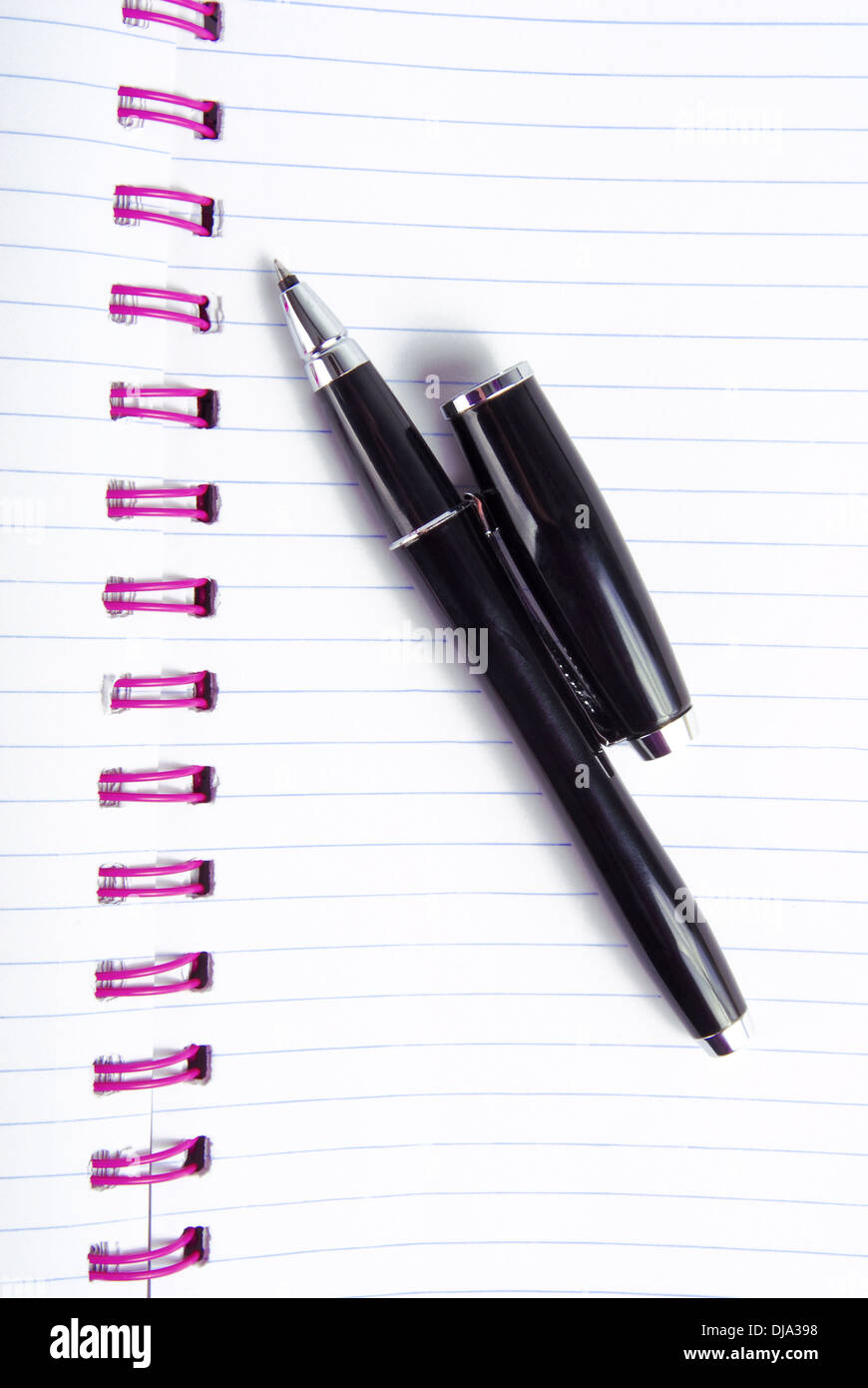 ballpoint pen and notebook Stock Photo - Alamy