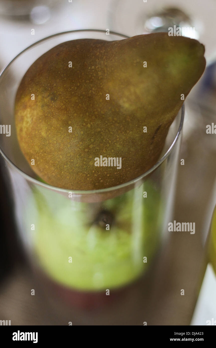A jar full of different color pears Stock Photo - Alamy