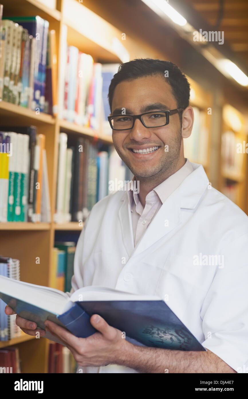 Attractive man posing in library hi-res stock photography and images ...