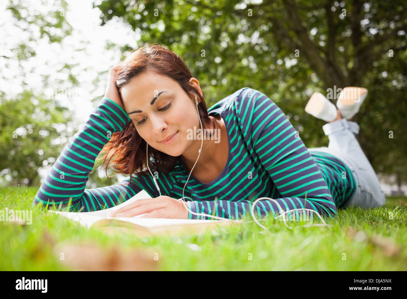 Peaceful student enjoying reading outdoors hi-res stock photography and ...