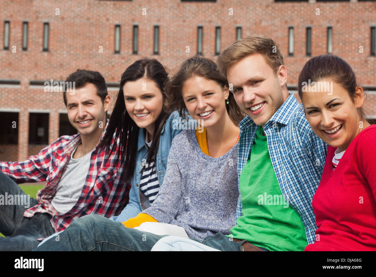 Five young students sitting hi-res stock photography and images - Alamy