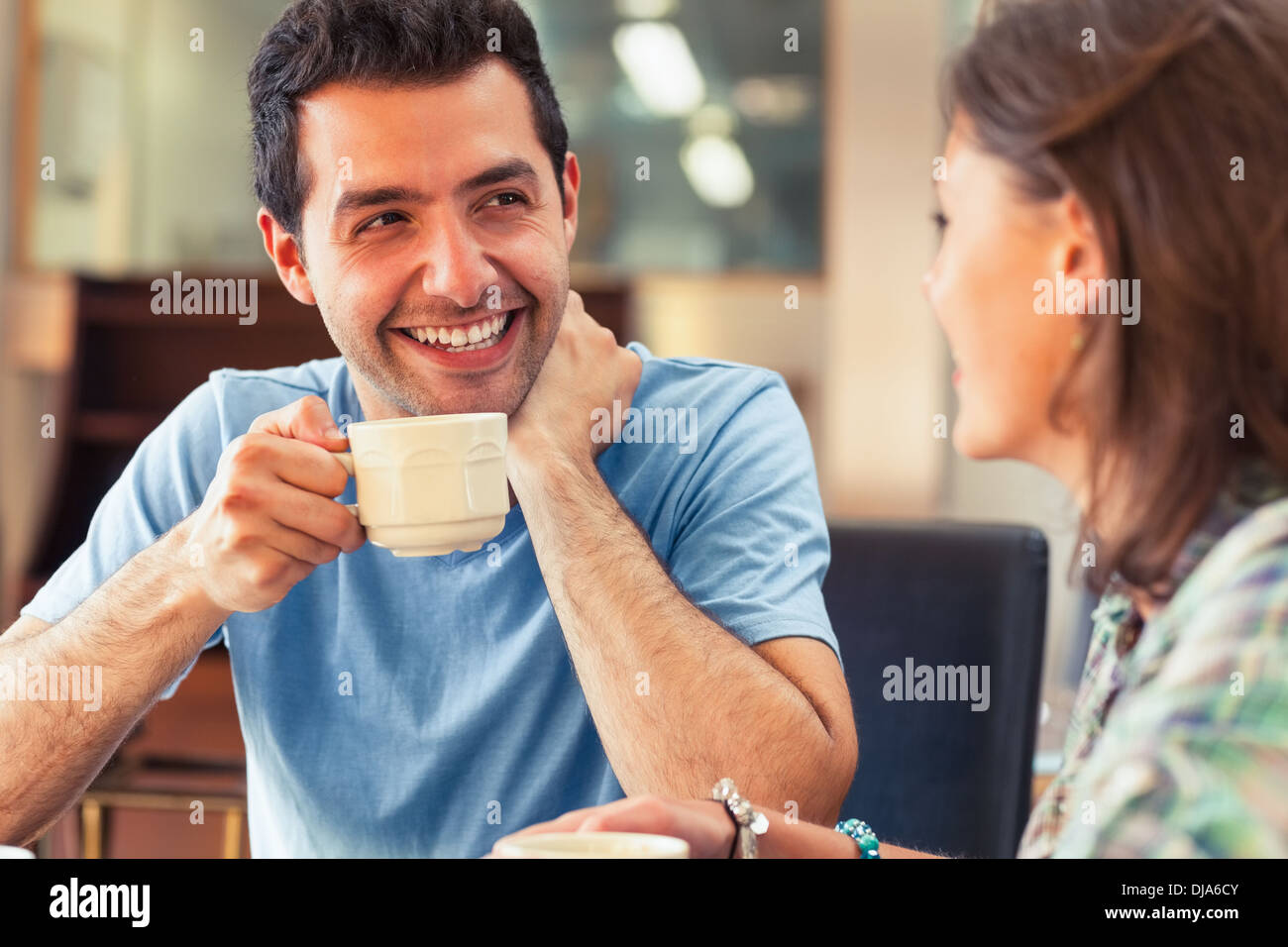 Two female students laughing talking hi-res stock photography and ...
