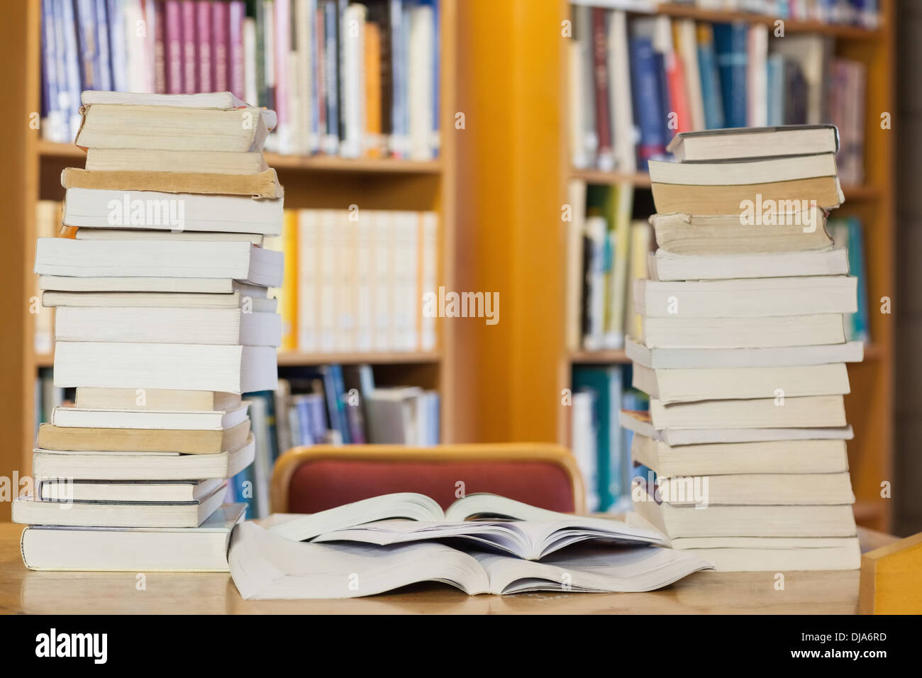 Books on desk hi-res stock photography and images - Alamy