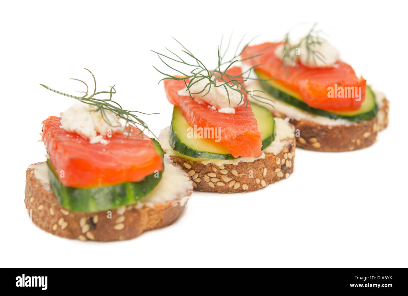 canapes with red fish on white background Stock Photo - Alamy
