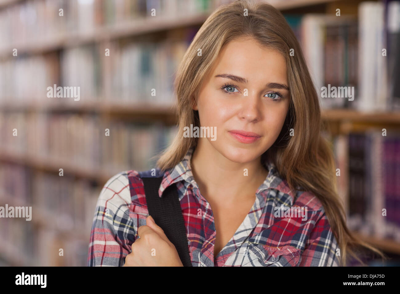 Pretty smiling student looking at camera Stock Photo - Alamy