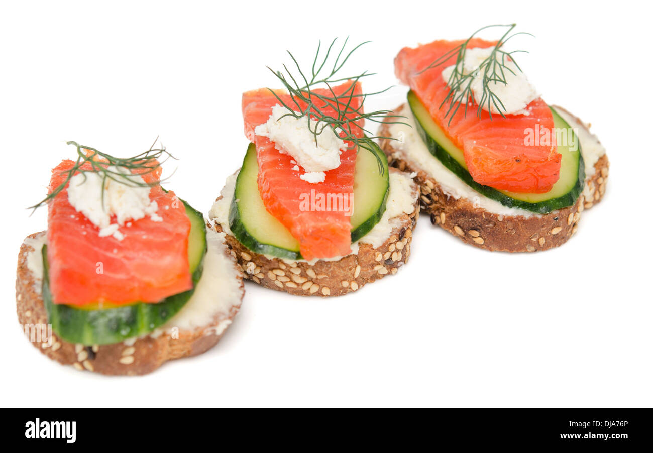 canapes with red fish on white background Stock Photo - Alamy