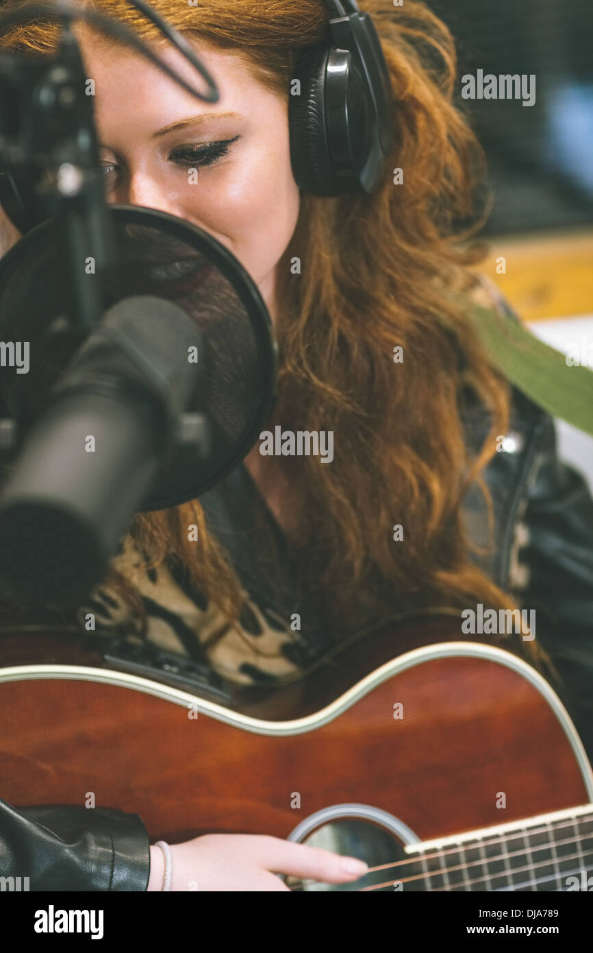 Redhead guitar female hi-res stock photography and images - Alamy