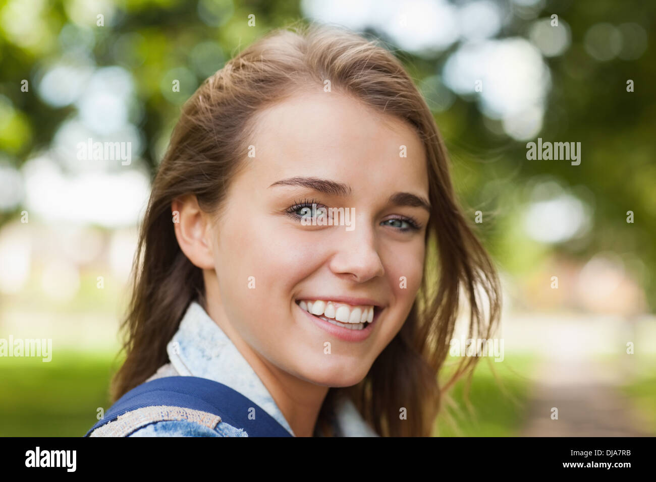 Happy cheerful smiling student hi-res stock photography and images - Alamy