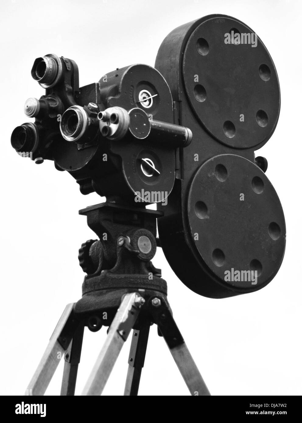 Black & white image of an old 1940's newsreel camera against a white ...