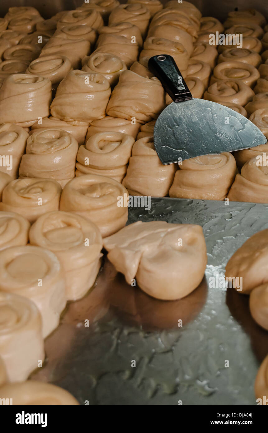 Traditional Arab pastries being prepared in a food stall at Deira ...