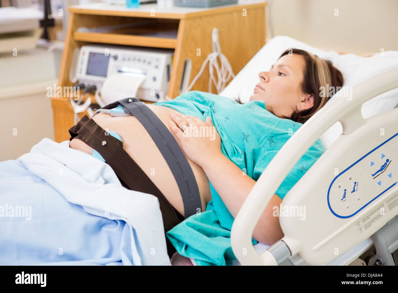 Birthing Woman with Electronic Fetal Monitor Attached Stock Photo - Alamy