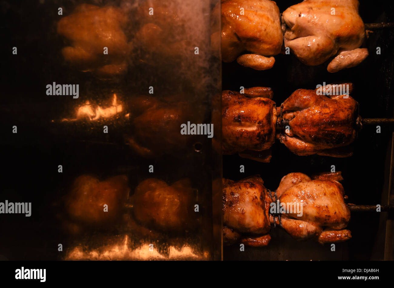 Spit roasted chicken hi-res stock photography and images - Alamy