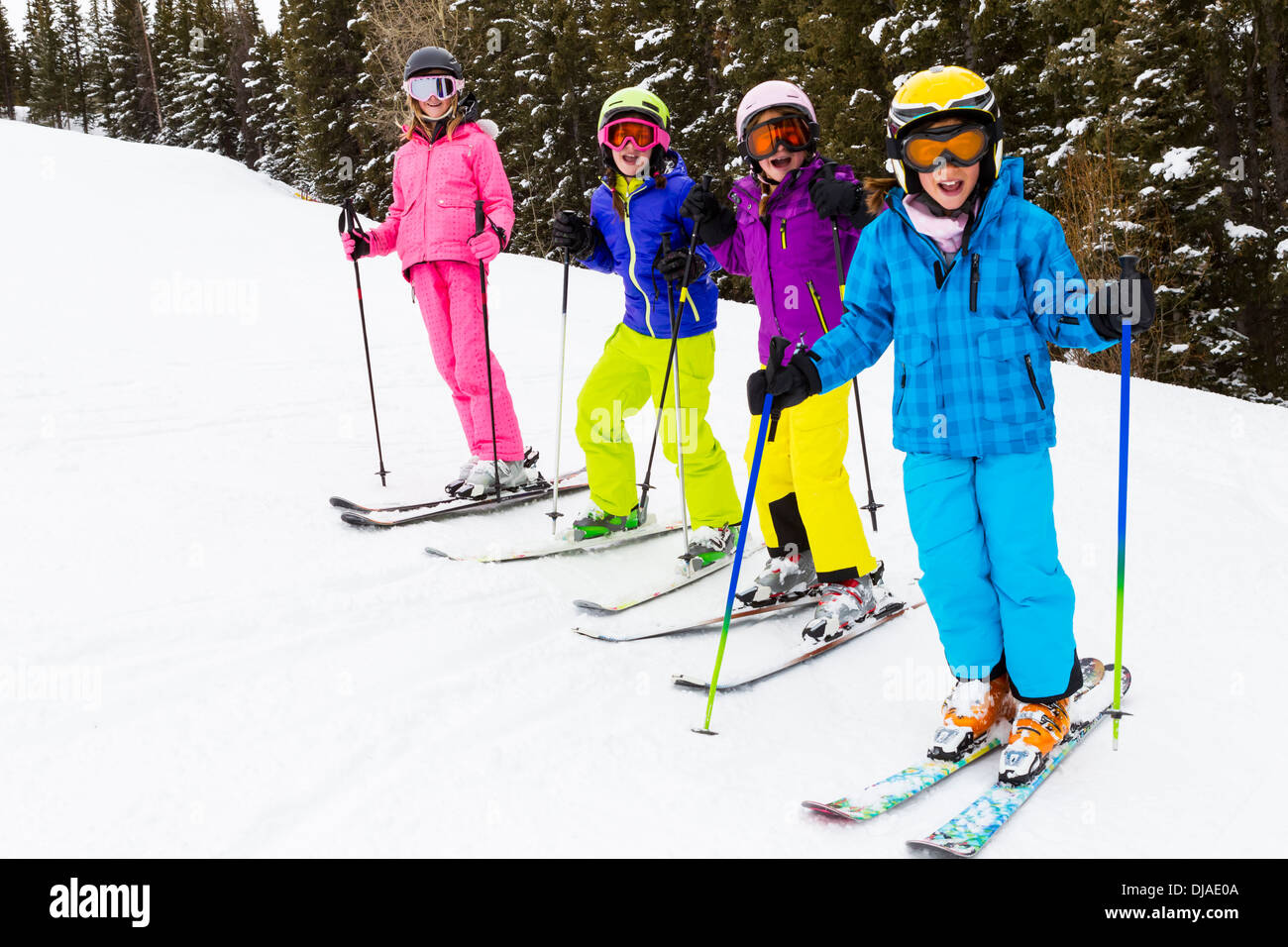 Children skiing together on snowy slope Stock Photo - Alamy