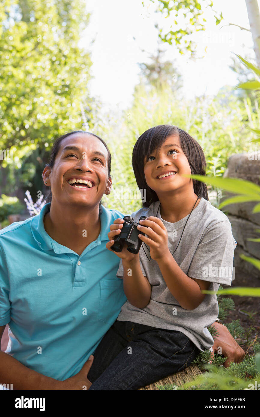 Father and son smiling outdoors Stock Photo - Alamy