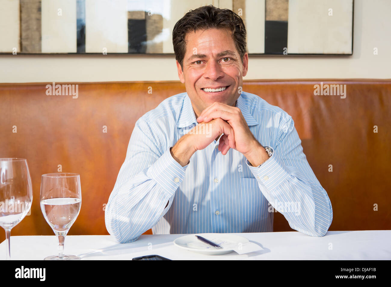 Man head hands dining table hi-res stock photography and images - Alamy