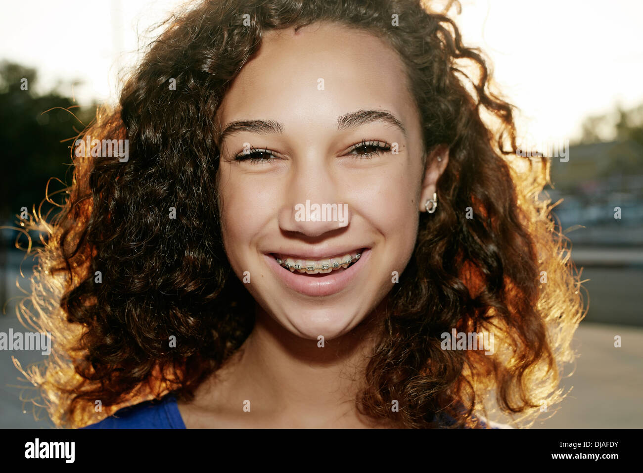 Mixed race girl smiling Stock Photo - Alamy