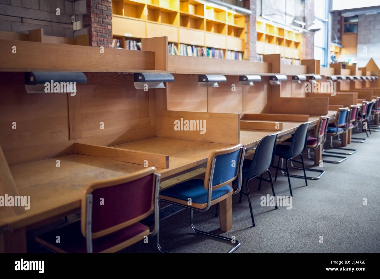Seats in a row at the college library Stock Photo - Alamy