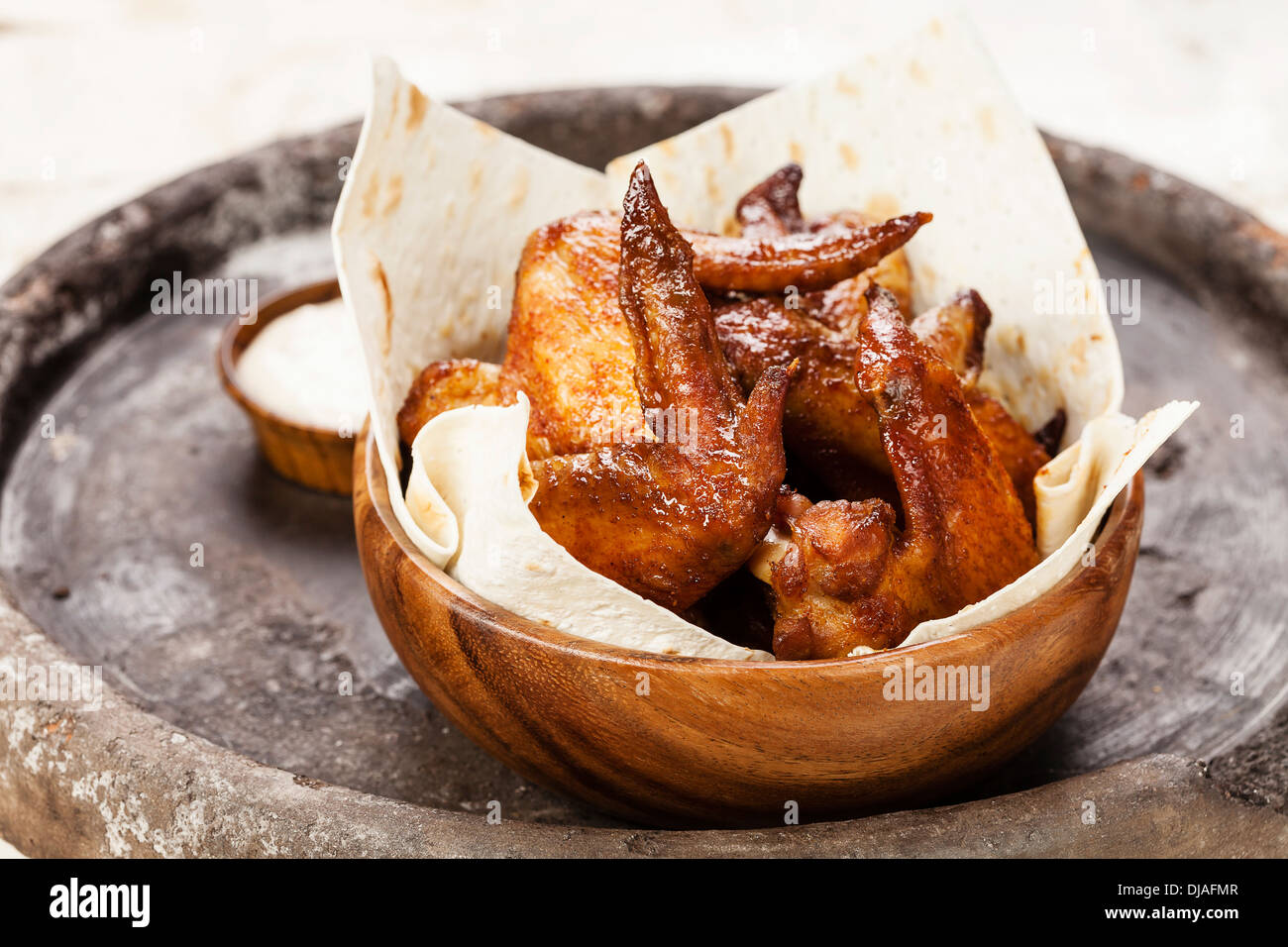Fried Chicken Wings in wooden bowl Stock Photo - Alamy