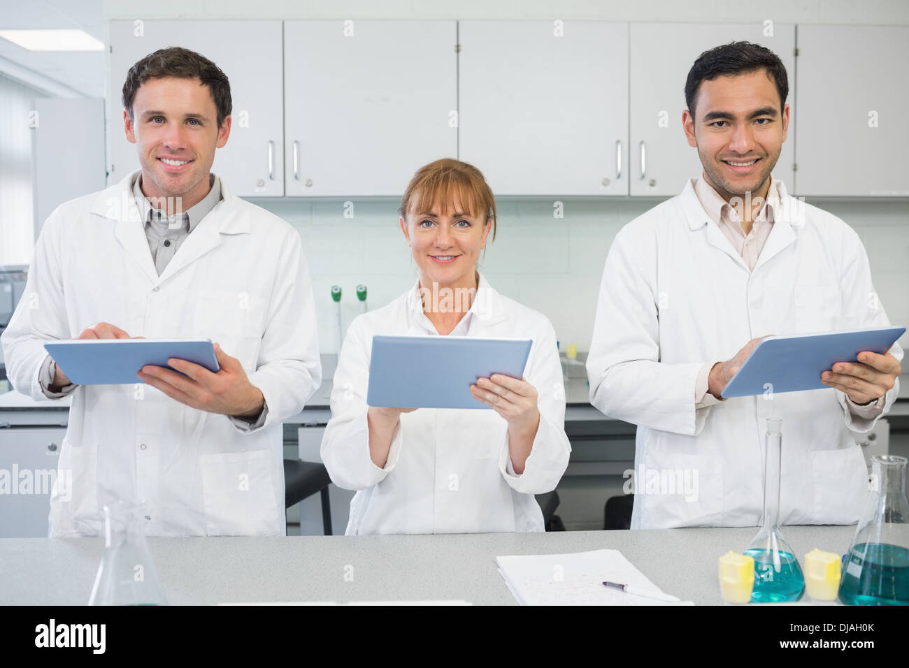 Mature woman scientist using tablet hi-res stock photography and images ...