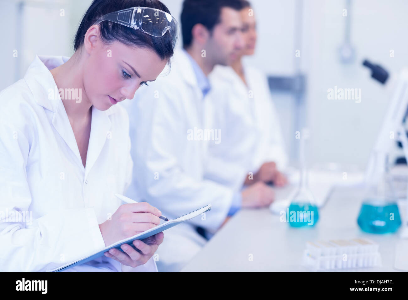 Female researchers standing holding hi-res stock photography and images ...