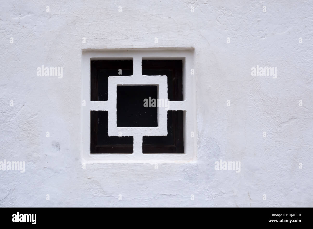 Spanish window design on white wall Stock Photo - Alamy