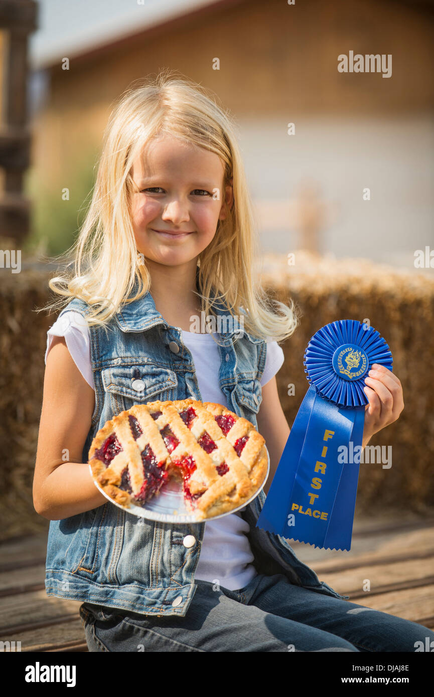 Caucasian girl with prize winning pie on farm Stock Photo - Alamy
