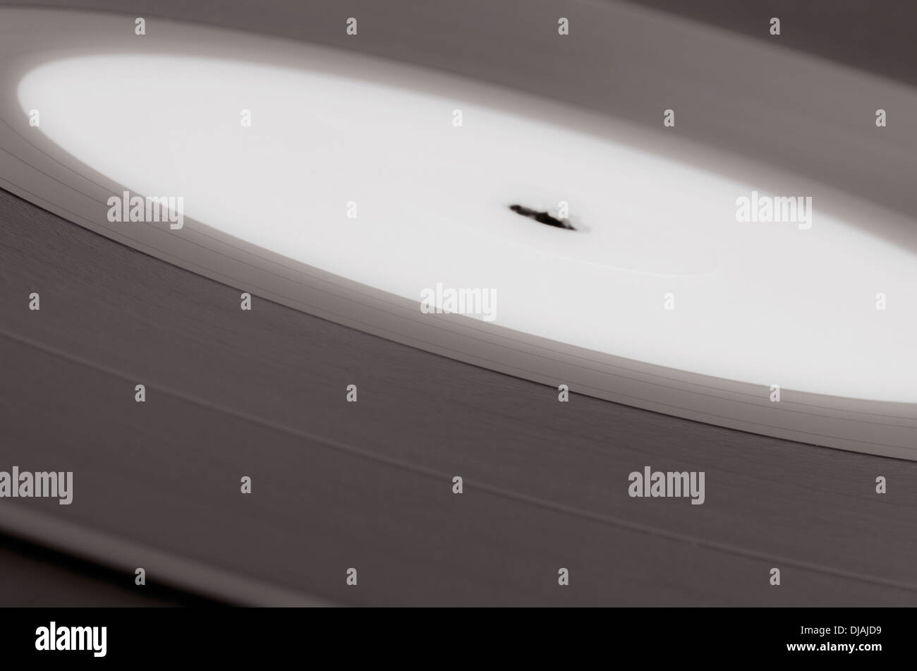 Close up of a vinyl record at an angle viewed from the side Stock Photo ...