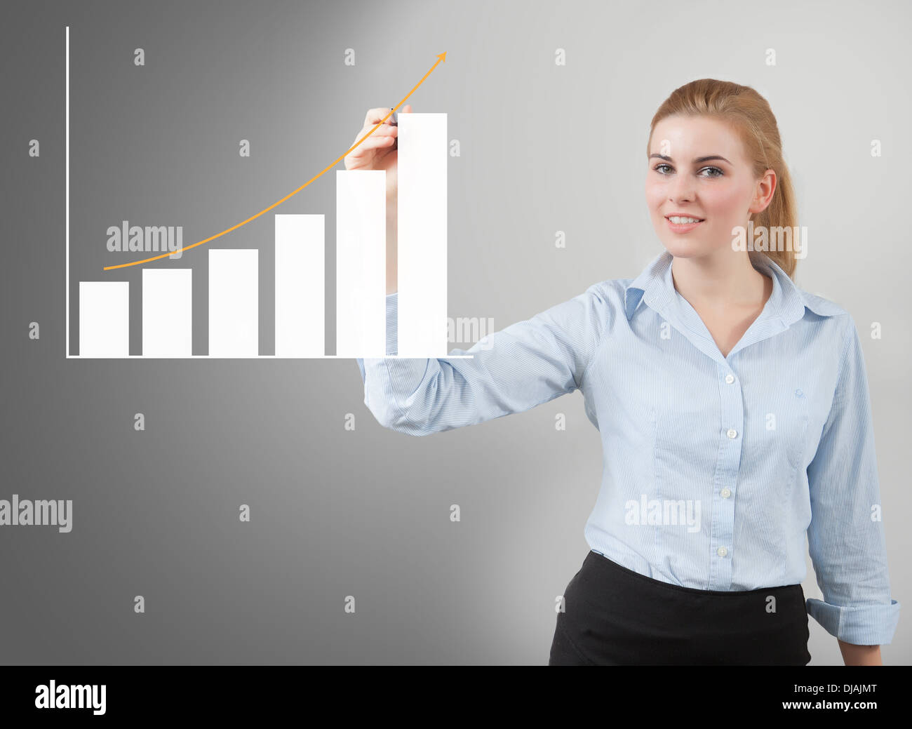 Handwritten chart by businesswoman on glass Stock Photo - Alamy