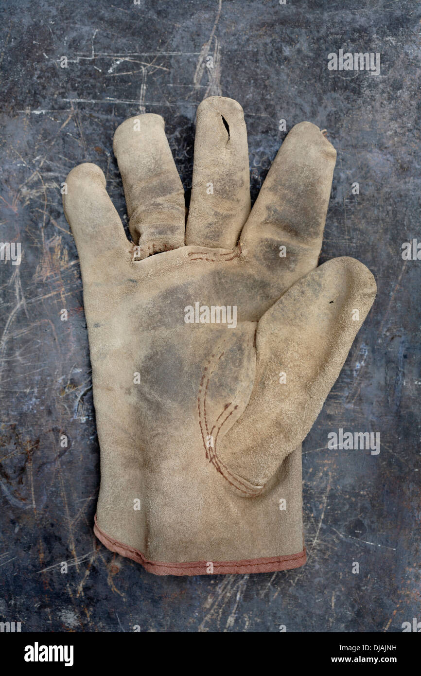 Close up of worn work glove Stock Photo - Alamy