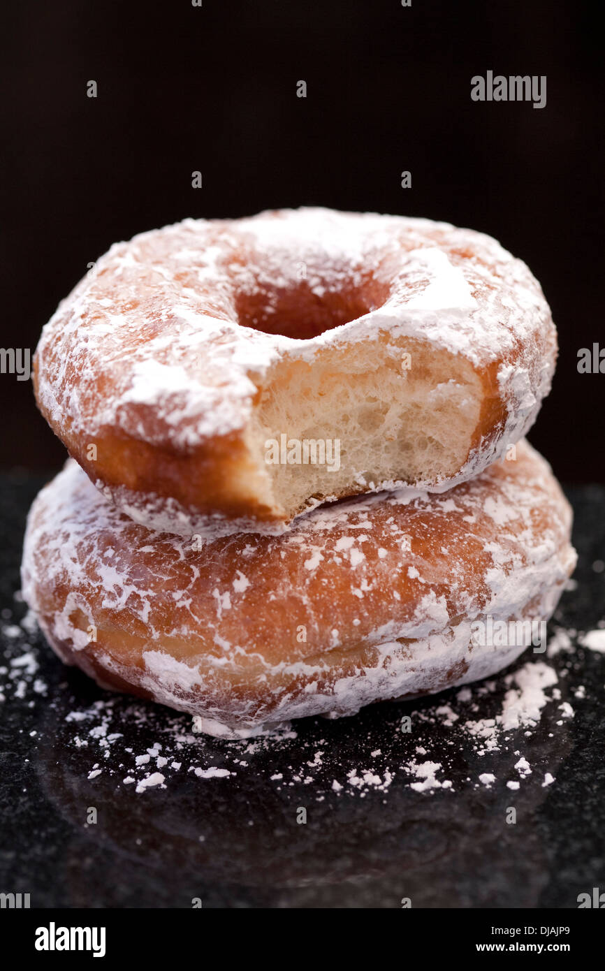 Close up of powdered donuts Stock Photo - Alamy