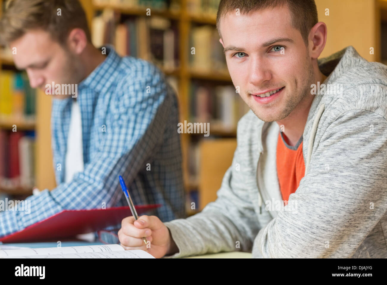 Student reading male desk hi-res stock photography and images - Alamy