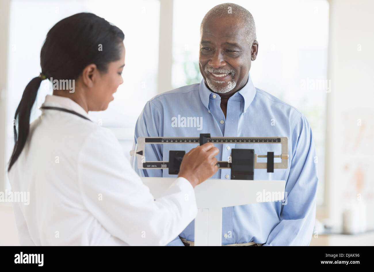 Senior black man measuring hi-res stock photography and images - Alamy