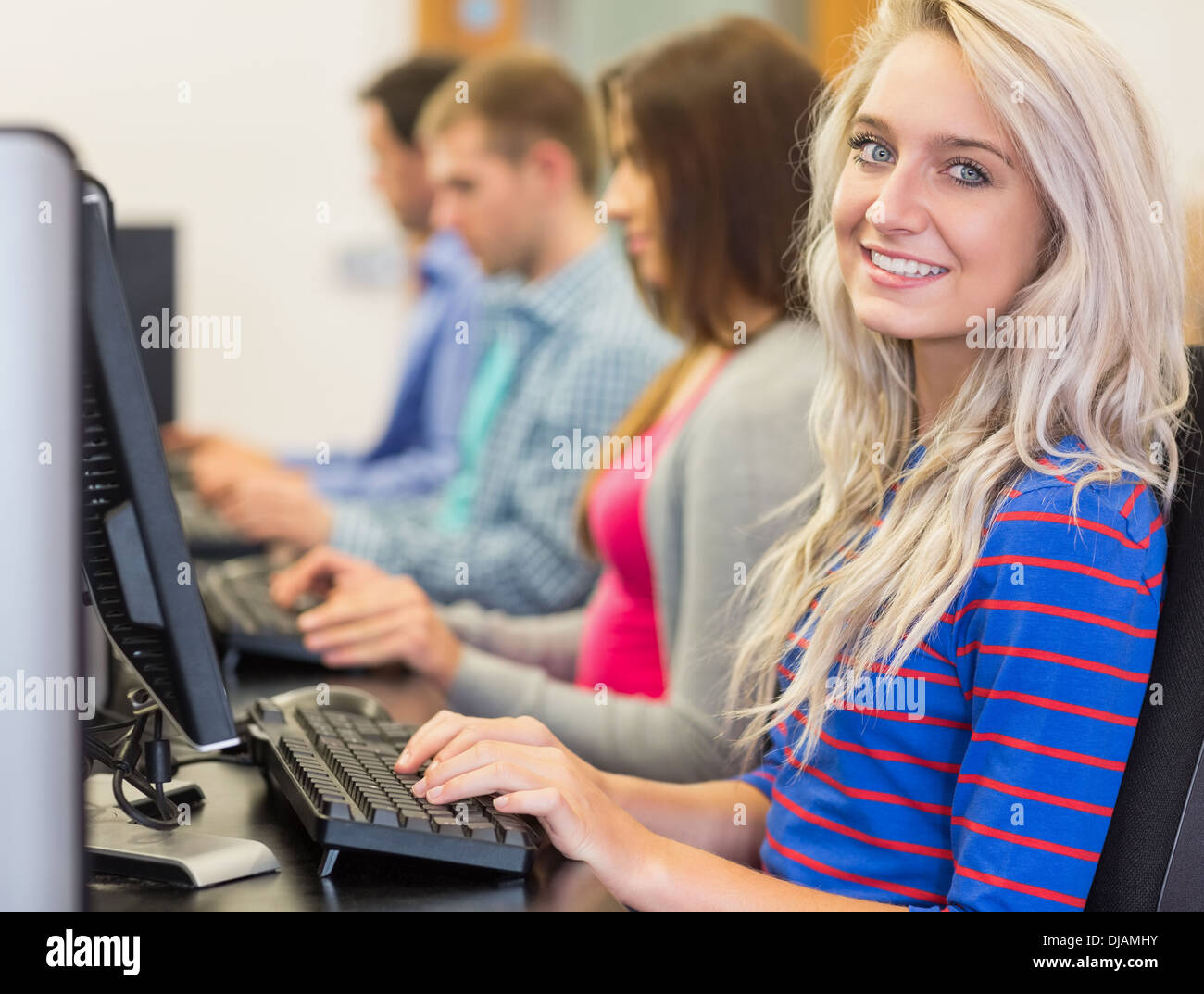 Students using computers in the computer room Stock Photo - Alamy