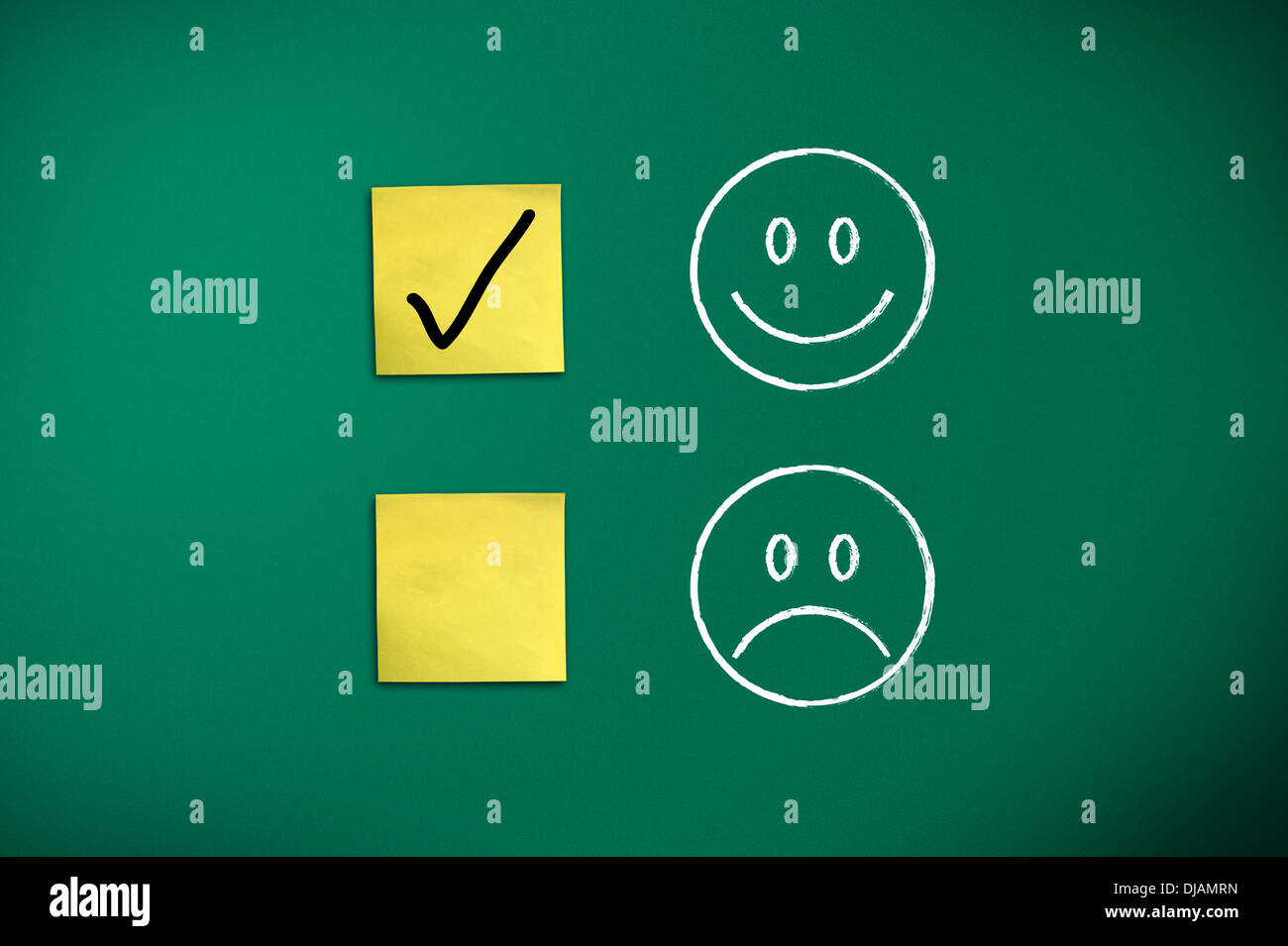 positive feedback rapresentated by emoticons on green chalk board Stock ...