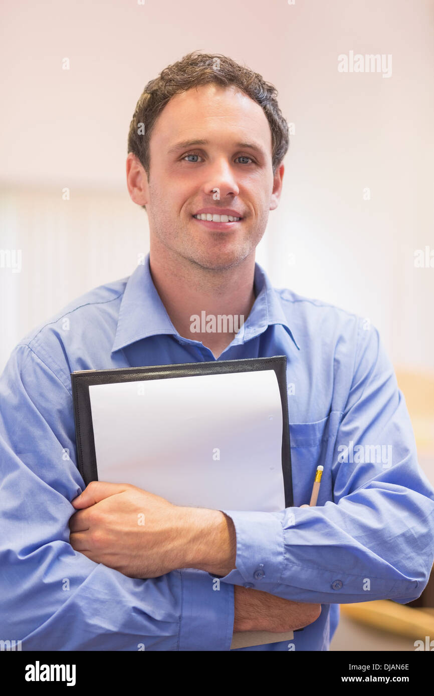 Close up portrait of an elegant male teacher with notepad Stock Photo ...