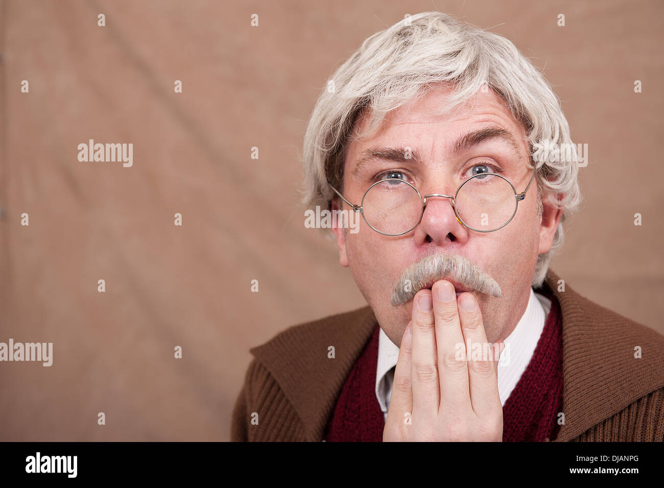Man hand over mouth hi-res stock photography and images - Alamy