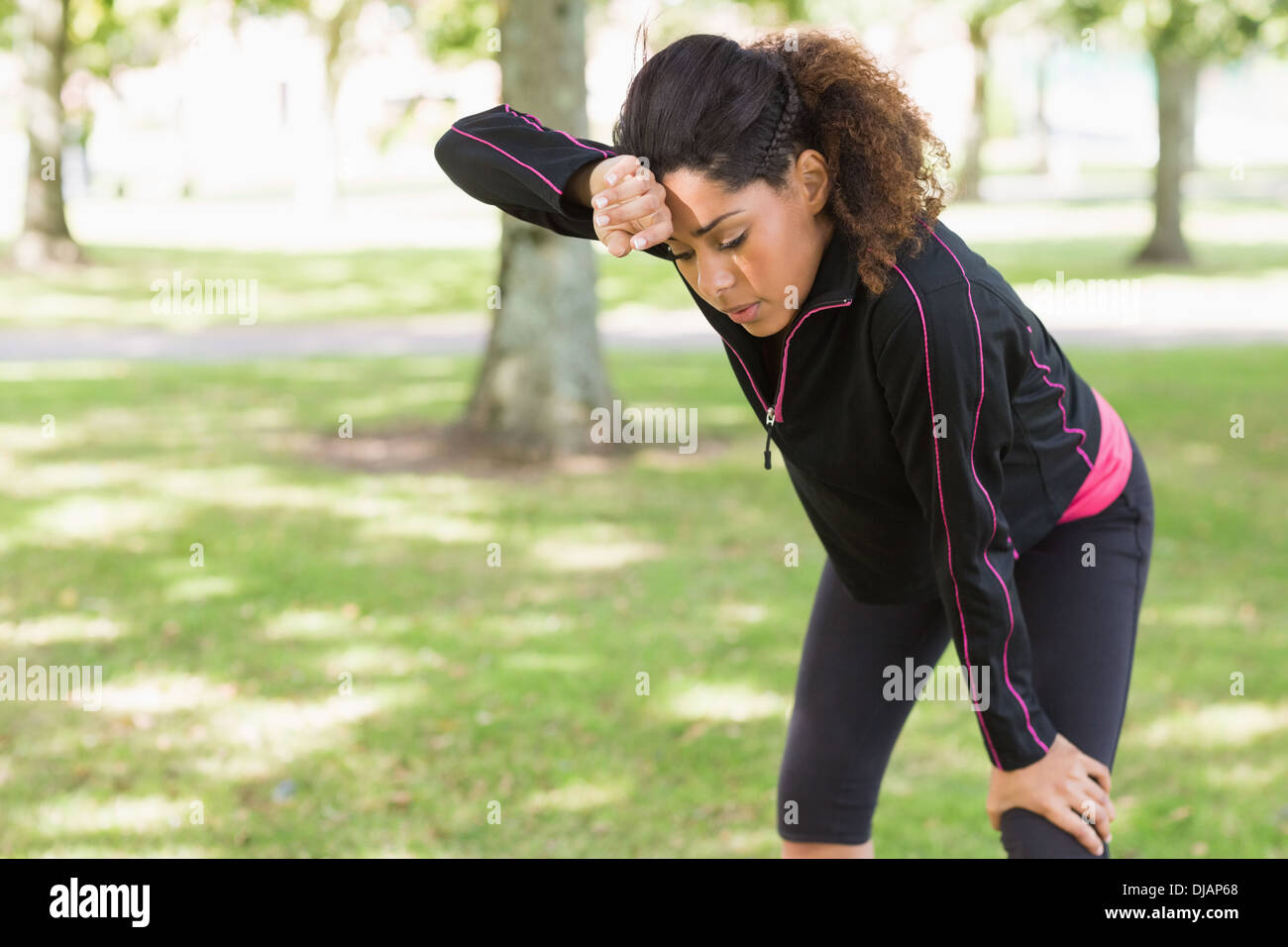 Woman jogging tired hi-res stock photography and images - Alamy